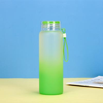 China Sturdy 550ml Glass Water Bottle With Protective Silicone Sleeve Multipurpose Frosted Water Bottle With Bamboo Lid Lightweight  Eco Friendly for sale