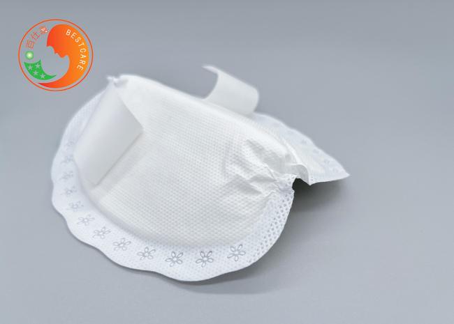 Ultra thin milk bra pads showing 3D contoured shape