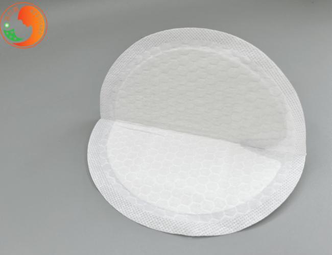 Round shape disposable breast pads showing thin profile