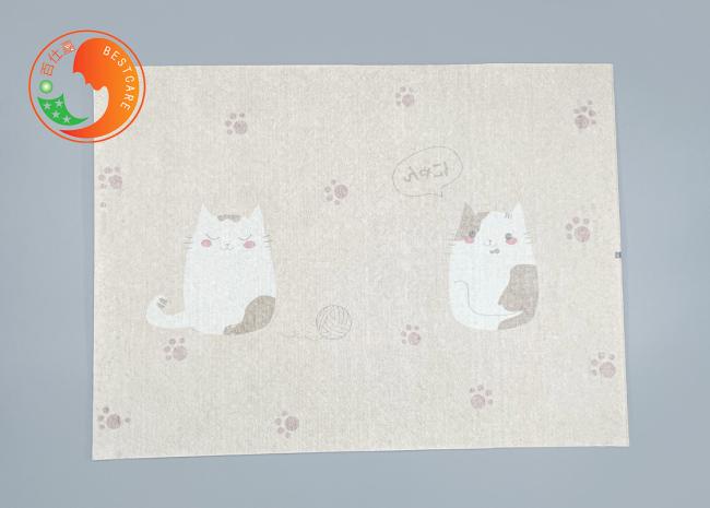 Disposable adhesive placemat in use during baby feeding