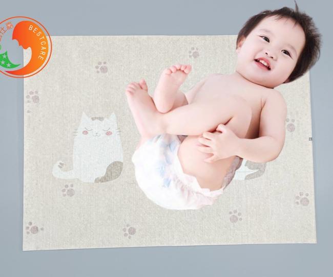 Disposable diaper mat showing folded and unfolded views