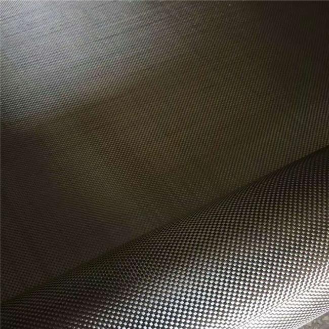 Detailed view of carbon fiber fabric texture