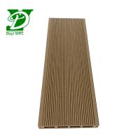 China Waterproof WPC Composite Decking 140x23mm Eco Friendly Hollow Wood Plastic Flooring for sale
