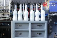 China 500ml HDPE Milk Bottle Making Machine Double Station 6 Head 110kg/h Output Blow Molding for sale