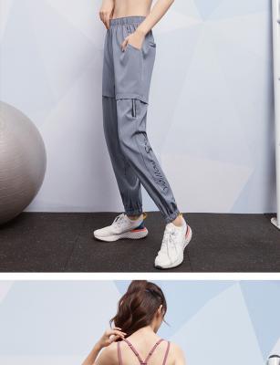 Cina Pantaloni 200g degli sport delle donne laterali della tasca di XS-5XL che eseguono i pantaloni della pista in vendita