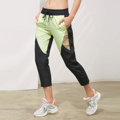 Cina pantaloni del pareggiatore del raccolto dei pareggiatori 180g dell'allenamento delle donne personalizzabili con la tasca in vendita
