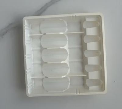 China Blister de plástico PET branco para medicamentos, com padrão de design anti- falsificação, embalagem e armazenamento for sale