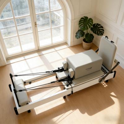 China Custom Logo Foldable Pilates Reformer Wood Material with Adjustable Features for Body Building for Pilates Studios for sale