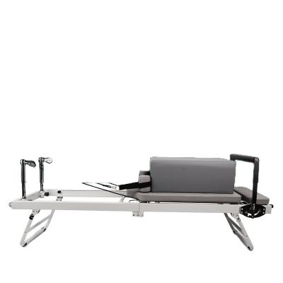 China Factory-Issued Stainless Steel Adjustable Pilates Reformer Quality Body Building Training Bed with Included Storage Box for sale
