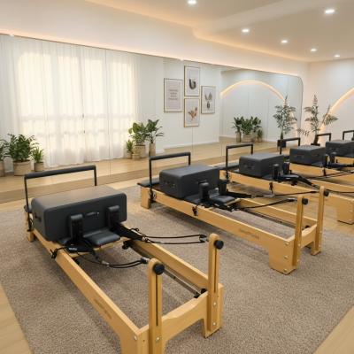 China Commercial Pilates Reformer Maple Wood Reformer Bed Portable Body Training Equipment for sale