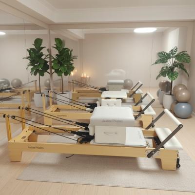 China Durable Factory Wooden Gym Equipment Reformers Machine Fitness Training Bed Beech Wood Yoga Pilates Reformer Studio Home for sale