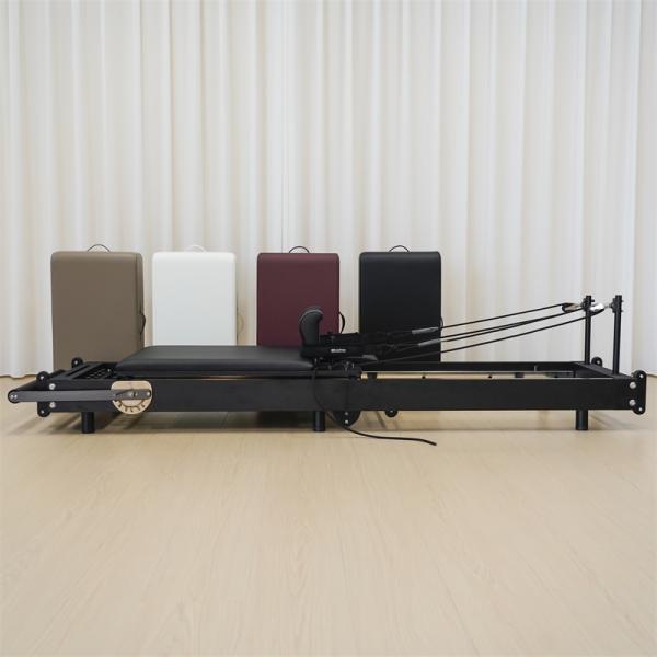 Quality Luxury Portable Reformer Pilates Beds Foldable Gym Equipment Wooden Reformer Beige for sale