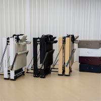 China Foldable Pilates Reformer 237x61x28cm Adjustable Portable Wood Plywood Custom Logo for sale