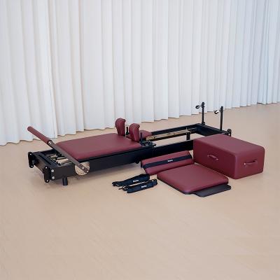 China Hot Sale Home Use Yoga Studio Plywood Portable Training Pilates Reformer Fitness Oak Foldable Pilates Reformer for sale