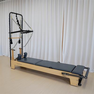 China Custom Wood Pilates Reformer With Tower For Studio Core Bed With Half Trapeze for sale