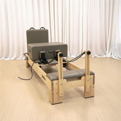 China Jaalee Studio OEM Warehouse Best Qualified Maple Wood Pilates Reformer Bed Customizable Color for Core Training Yoga Fitness for sale