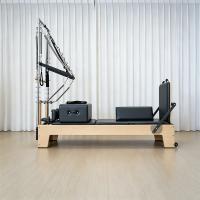 China Jaalee Multi-layer Solid Wood Pilates Reformer with Half Tower 2540x680x2015mm Customizable for sale