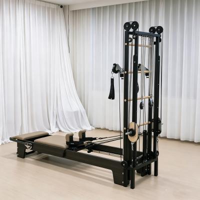China Factory Direct Solid Wood Pilates Reformer With Spiral Half Trapeze Tower Customizable Frame Color Leather Logo Complete Accessories for sale