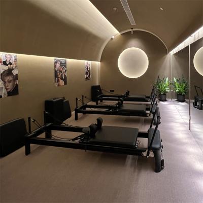 China Black Full track Pilates Aluminum Pilates Reformer Machine Portable Studio Use Pilates Reformer Aluminum Alloy Fitness Bed for sale