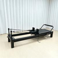 China User friendly Pilates Reformer machine featuring adjustable springs padded platform and sturdy frame for performance for sale
