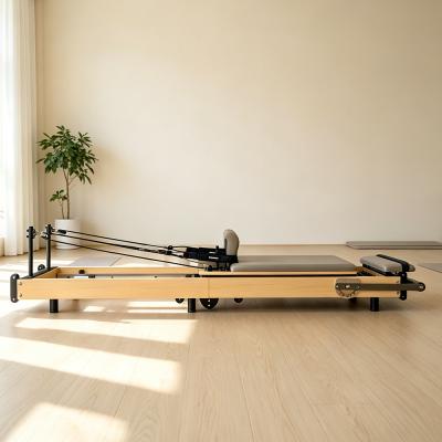 China Commercial  Use Foldable PiyWood Yoga Reformer Pilates Machine For Home Fitness Bodybuilding Pilates Studio With CE Certified for sale