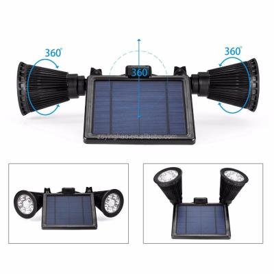 China Zonne-energie-aangedreven dubbele kop geüpgraded dubbele schijnwerpers 12 LED buitentuin licht Te koop