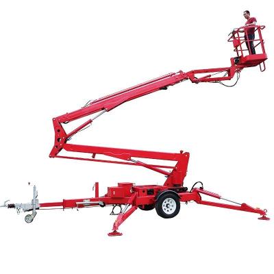 China Yellow 10m Tow Behind Cherry Picker 200KG 30 Ft Towable Boom Lift for sale