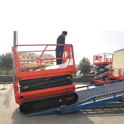 Cina Piattaforma aerea semovente a pantografo per terreni accidentati, cingolata, idraulica in vendita