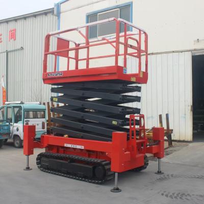 Cina Piattaforma aerea semovente a pantografo per terreni accidentati, cingolata, idraulica in vendita