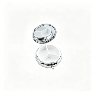 China Round or square metal pillbox, small women's pillbox with mirror, portable mini metal pillbox, suitable for carrying vitamins and medicines on daily travel. for sale