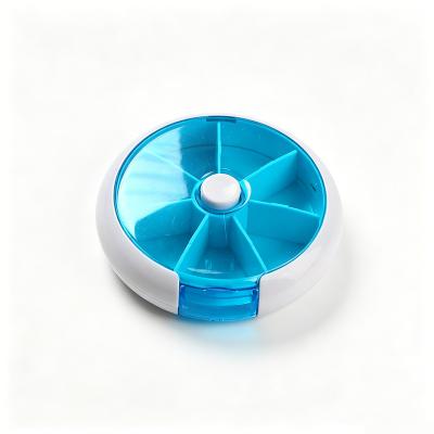 China 7 Day Round Pill Box Portable Fruit Case Rotating Travel Storage for sale