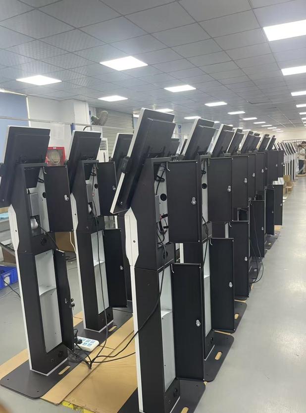 Close-up of kiosk payment module with card reader and QR scanner