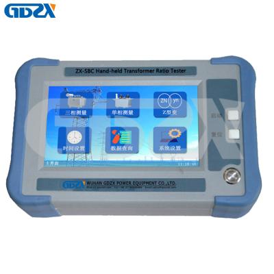 Cina ZX-SBC Cina Prezzo di fabbrica Batteria incorporata Tester di rapporto del trasformatore di alta precisione portatile in vendita