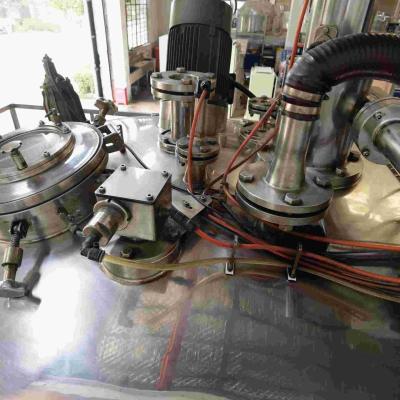 Cina borsa automatica 300v che tira la centrifuga inferiore di scarico della ruspa spianatrice per i cosmetici in vendita