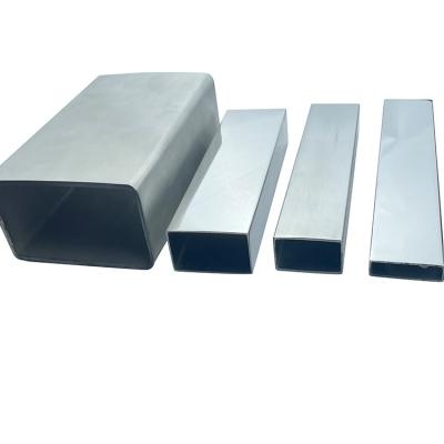 Cina Decorativo TUBO BRILLANTE RETTANGOLARE HA LUCIDATO 600 C-304 X tubo piano di acciaio inossidabile Inox di 6 METROPOLITANE in vendita