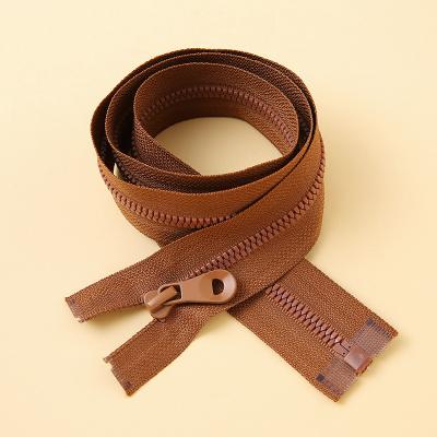 China Lightweight #5 Resin Coil Zipper With Hard Material Thick Teeth Open End Design for sale