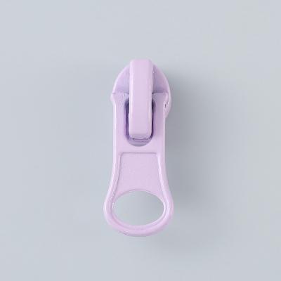 China Sleek And Modern Auto Lock Slider 3# Nylon Coil Zipper Slider for sale
