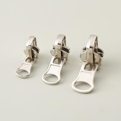 China Resin Reversible Slider Dual Action Two Way Zipper Slider With Precision Molded Teeth for sale