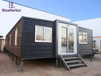 中国 ポータブル モジュール式 ダブル ウイング プリファブ コンテナハウス 折りたたみ 20フィート 40フィート 販売のため