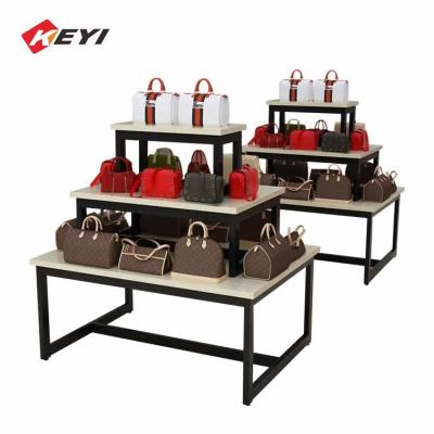 China Boutique Freestanding Metal And Wood Handbag Display Stand Retail Display Table For Bag for sale