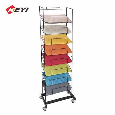 China Custom High Quality Floor Standing Metal Placemat Display Rack With 4 casters for sale