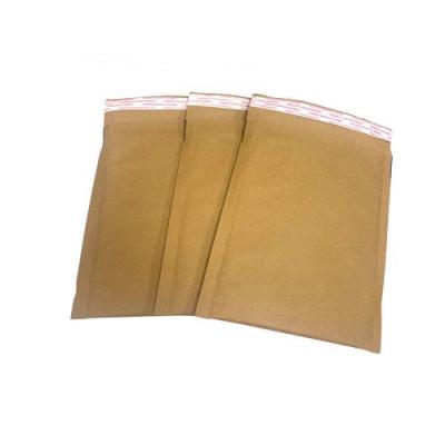 China Duurzaam gerecycled kraftpapier met honingraat gepoleerde mailerverpakking Te koop