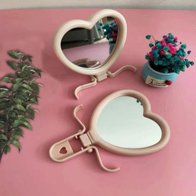 Cina Lady Dressing in forma di cuore Tasca regolabile trucco Compatto Mini Specchio con Qualit in vendita