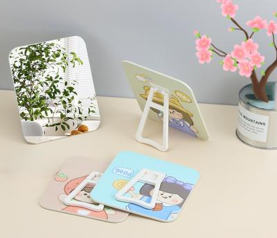 China Everyday Design Pocket Adjustable Mini Cosmetic Table with Custom Round Make-Up Mirror for sale