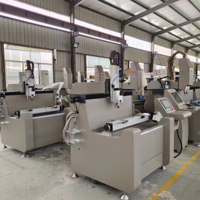 China Máquina de perfuração CNC de perfis de alumínio para janelas e portas Máquina de fresagem de perfuração CNC com controlo de 3 eixos à venda