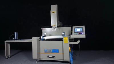 China Máquina de perfuração CNC de perfis de alumínio para janelas e portas Máquina de fresagem de perfuração CNC com controlo de 3 eixos à venda
