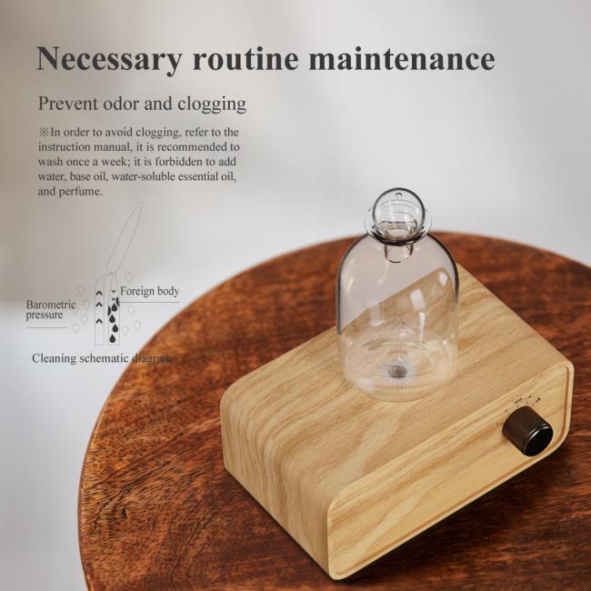 Close-up view of aroma diffuser nozzle and control interface