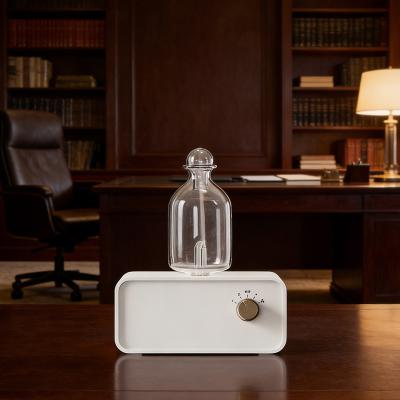 China Dual Fluid Cold Nebulization Essential Oil Diffuser 100cbm With Rechargeable Lithium Battery for sale