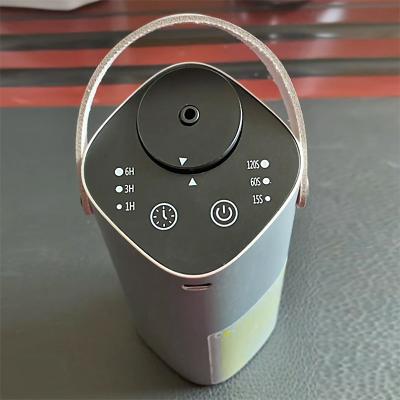China Portable 2000mAh Battery Car Aroma Diffuser with Two-Fluid Atomization and Removable Atomization Core for sale