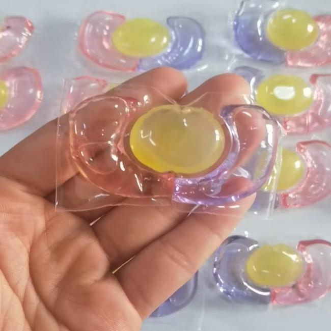 Close-up view of 3-in-1 laundry capsules
